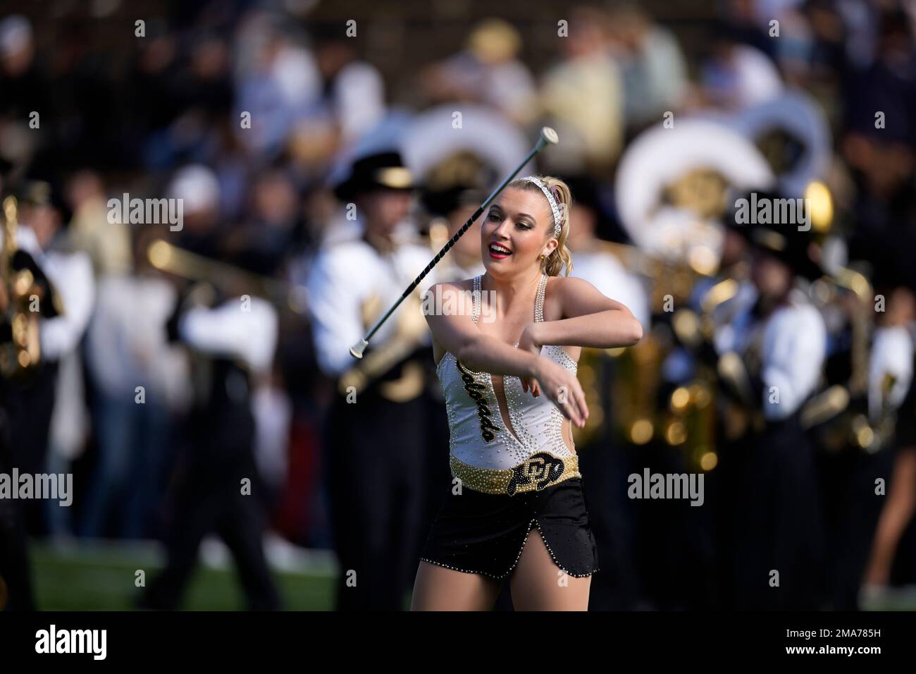 Colorado marching band baton twirler performs in the first half of an ...