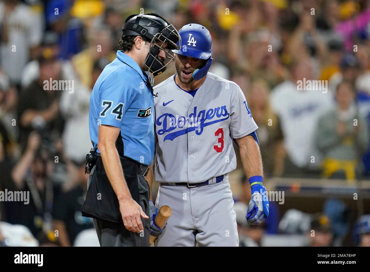Los Angeles Dodgers' Chris Taylor has a word with home plate umpire ...