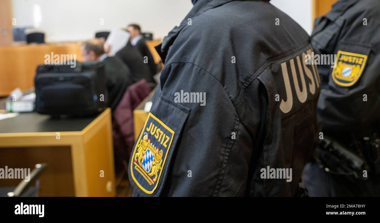 Augsburg, Germany. 19th Jan, 2023. Judicial guards guard defendants at ...