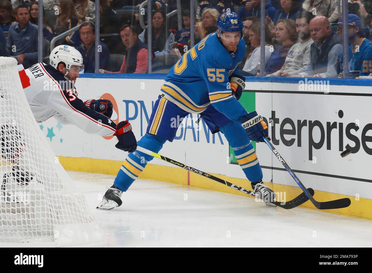 St. Louis Blues' Colton Parayko (55) battles for the puck against ...