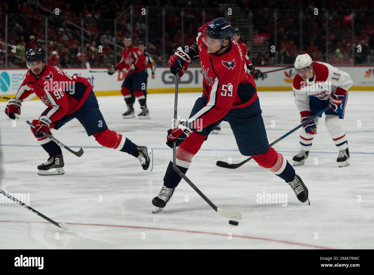 Washington Capitals center Aliaksei Protas (59) breaks his stick while ...