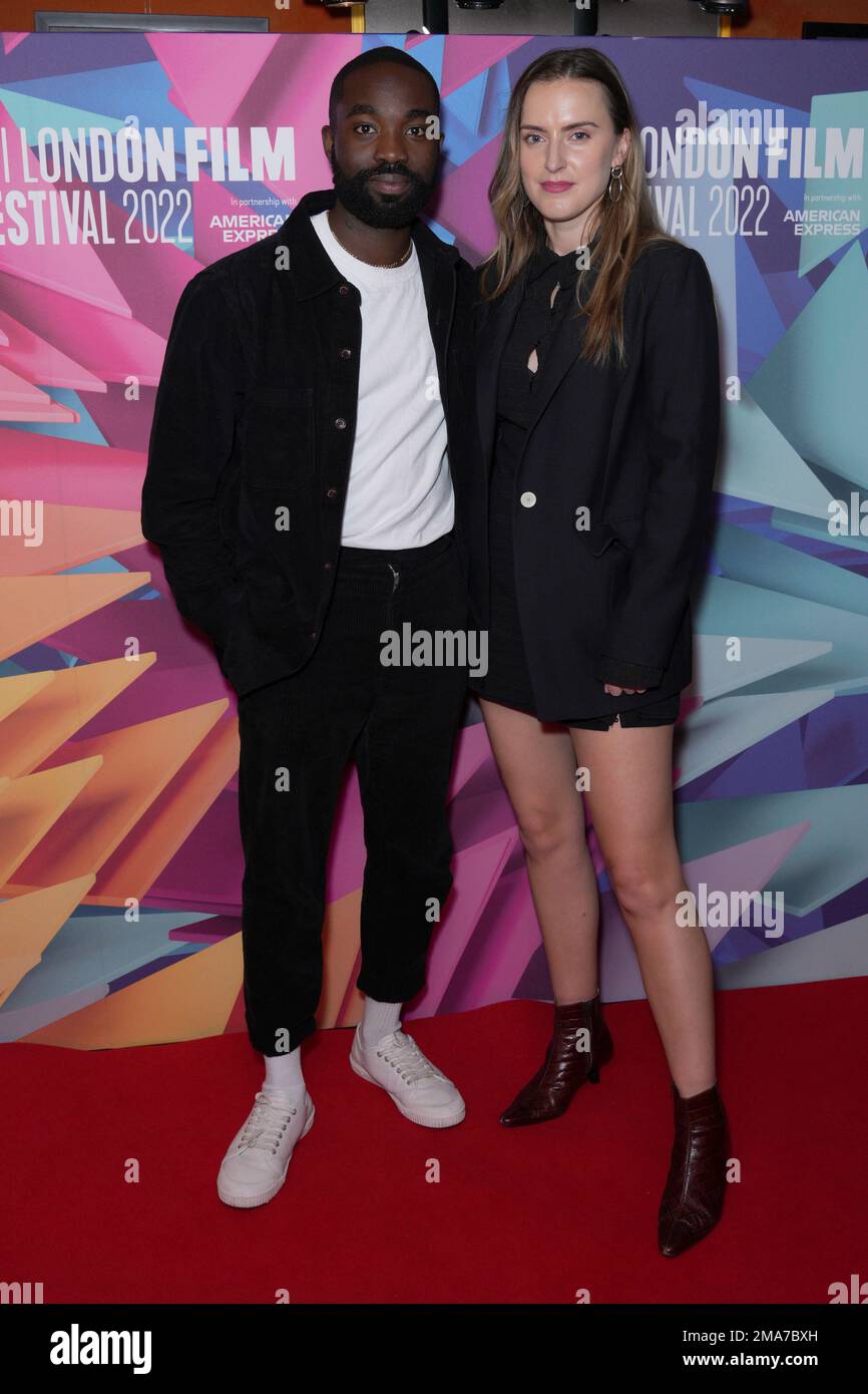 Paapa Essiedu, left, and Rosa Robson pose for photographers upon ...