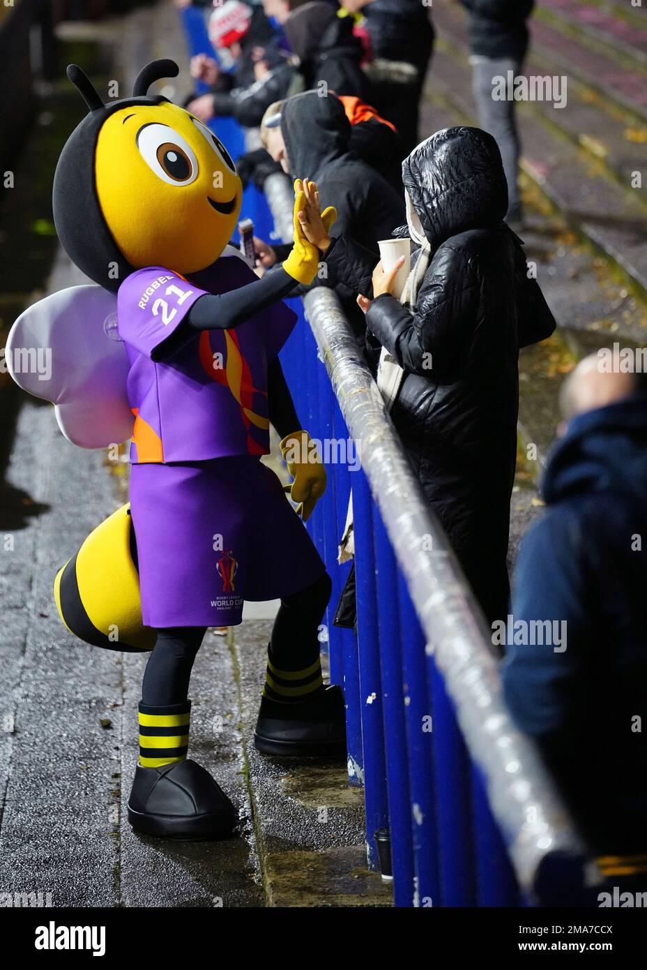 A RugBee mascot greets fans ahead of the Rugby League World Cup match ...