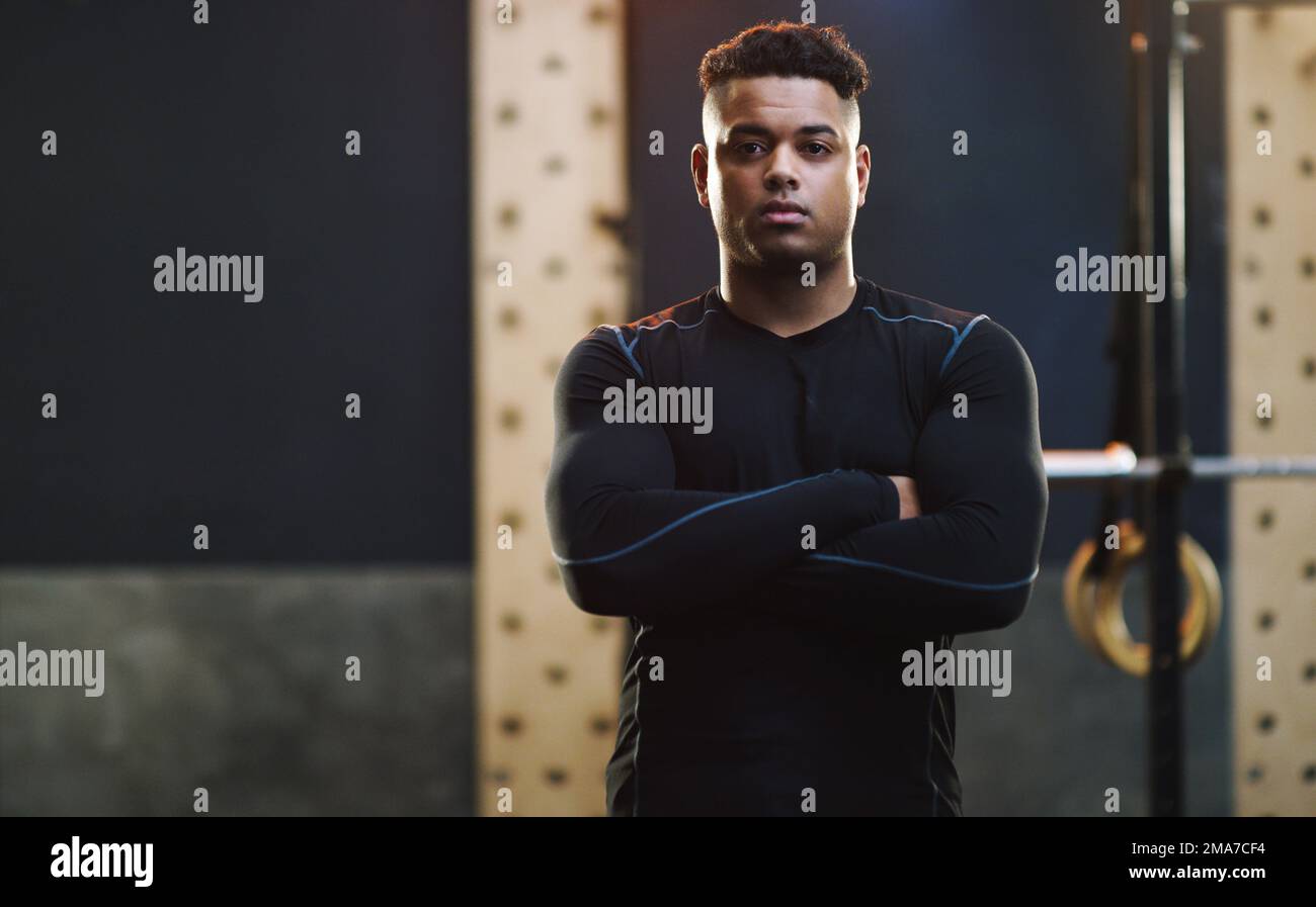 Muscular man crossed arms hi-res stock photography and images - Alamy