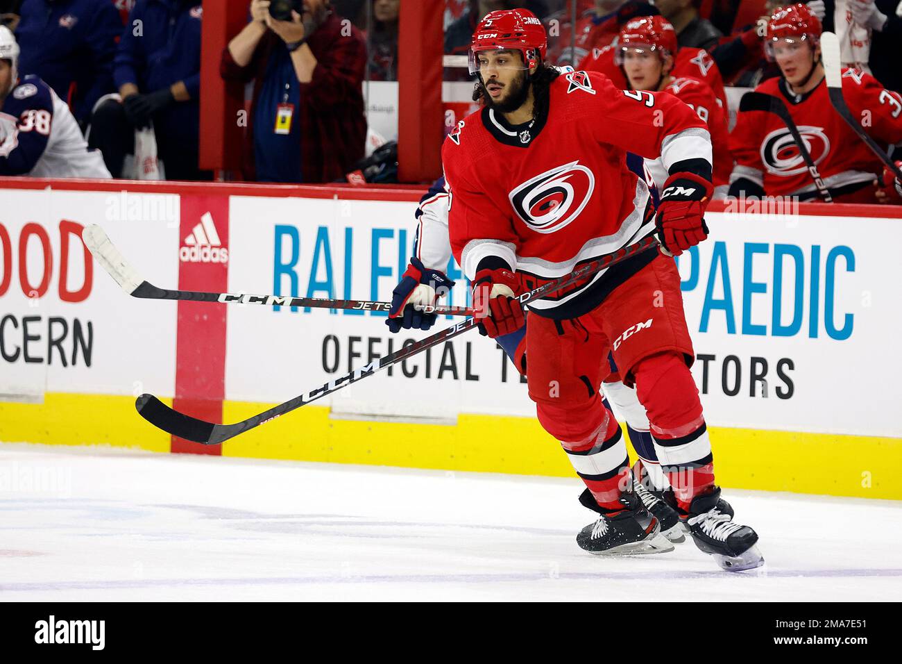 Carolina Hurricanes' Jalen Chatfield (5) skates against the Columbus ...