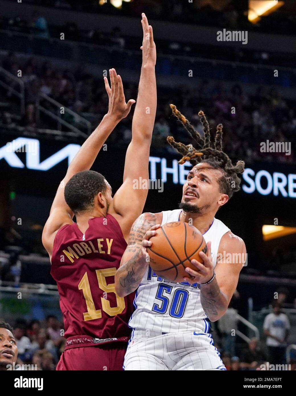 Orlando Magic's Cole Anthony (50) takes a shot as he gets behind ...