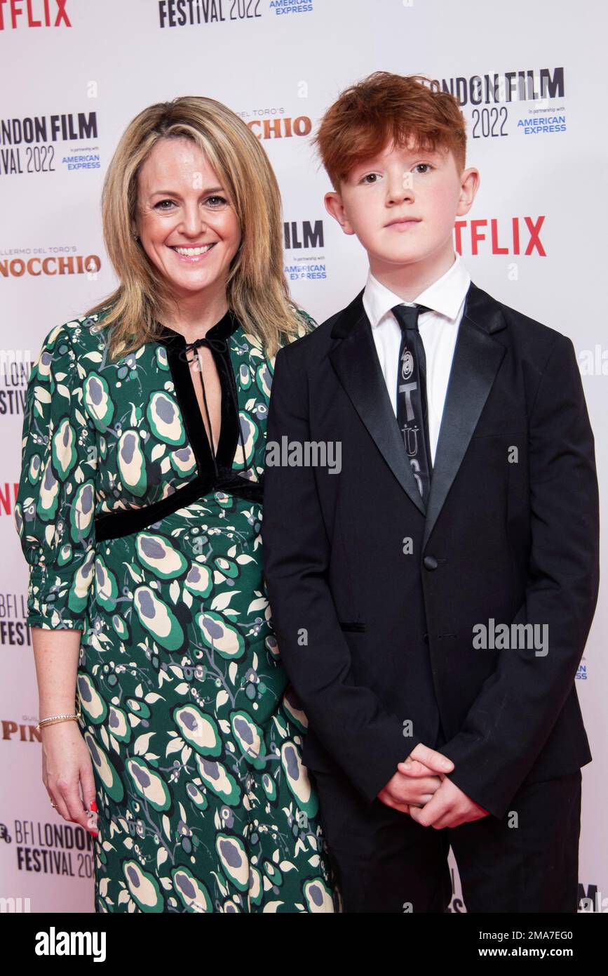 Julian Mann and her son Gregory Mann pose for photographers upon ...