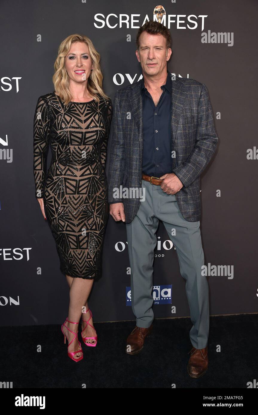 Courtney Lauren Penn, left, and Thomas Jane arrive at a red carpet ...