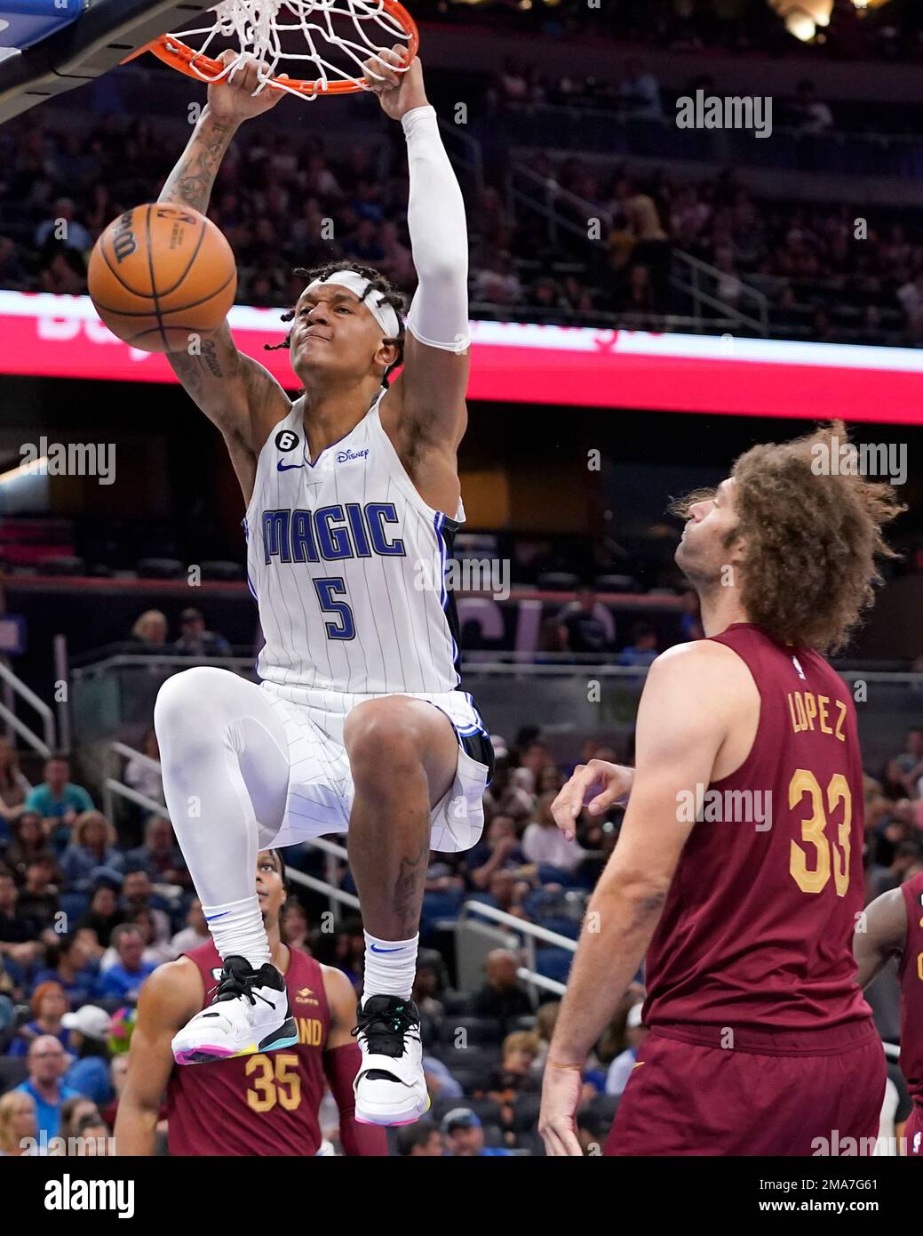 Orlando Magic's Paolo Banchero (5) dunks over Cleveland Cavaliers ...