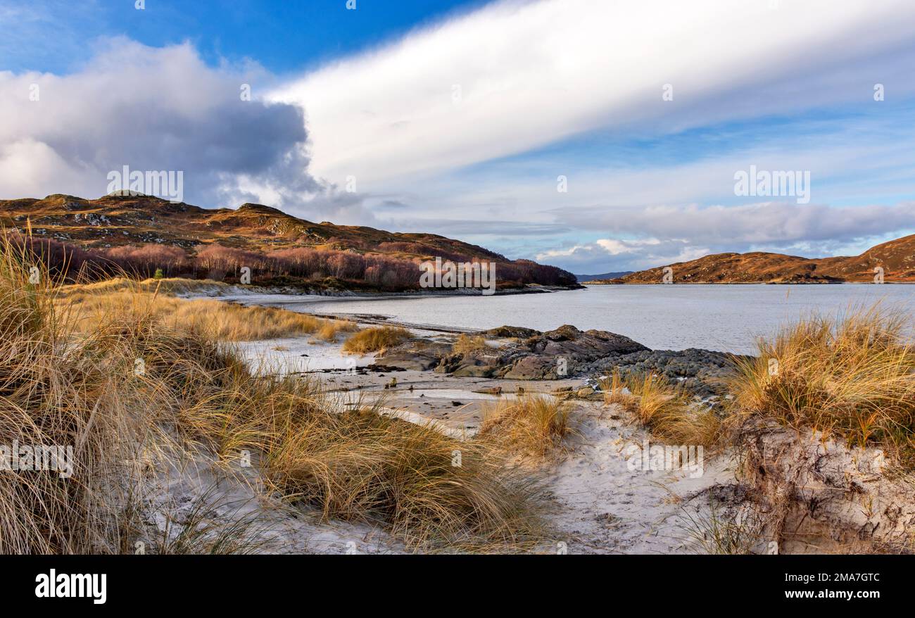 Morar Highland Scotland sunshine over a small white peaceful sand beach ...