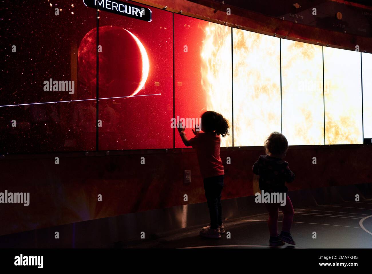 Children play at an exhibit inside the Children play at an exhibit inside the