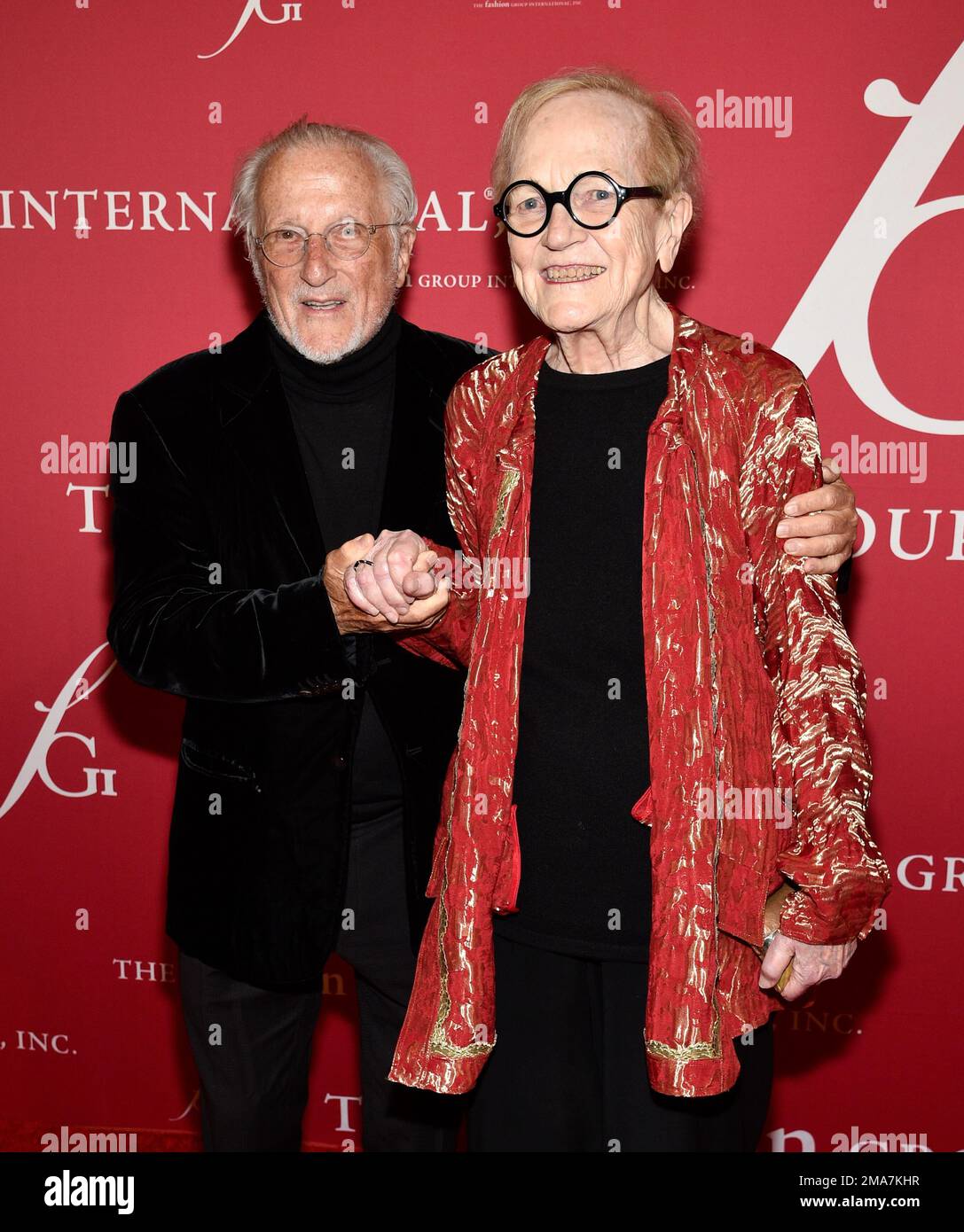 Stan Herman, left, and Marylou Luther attend the Fashion Group ...