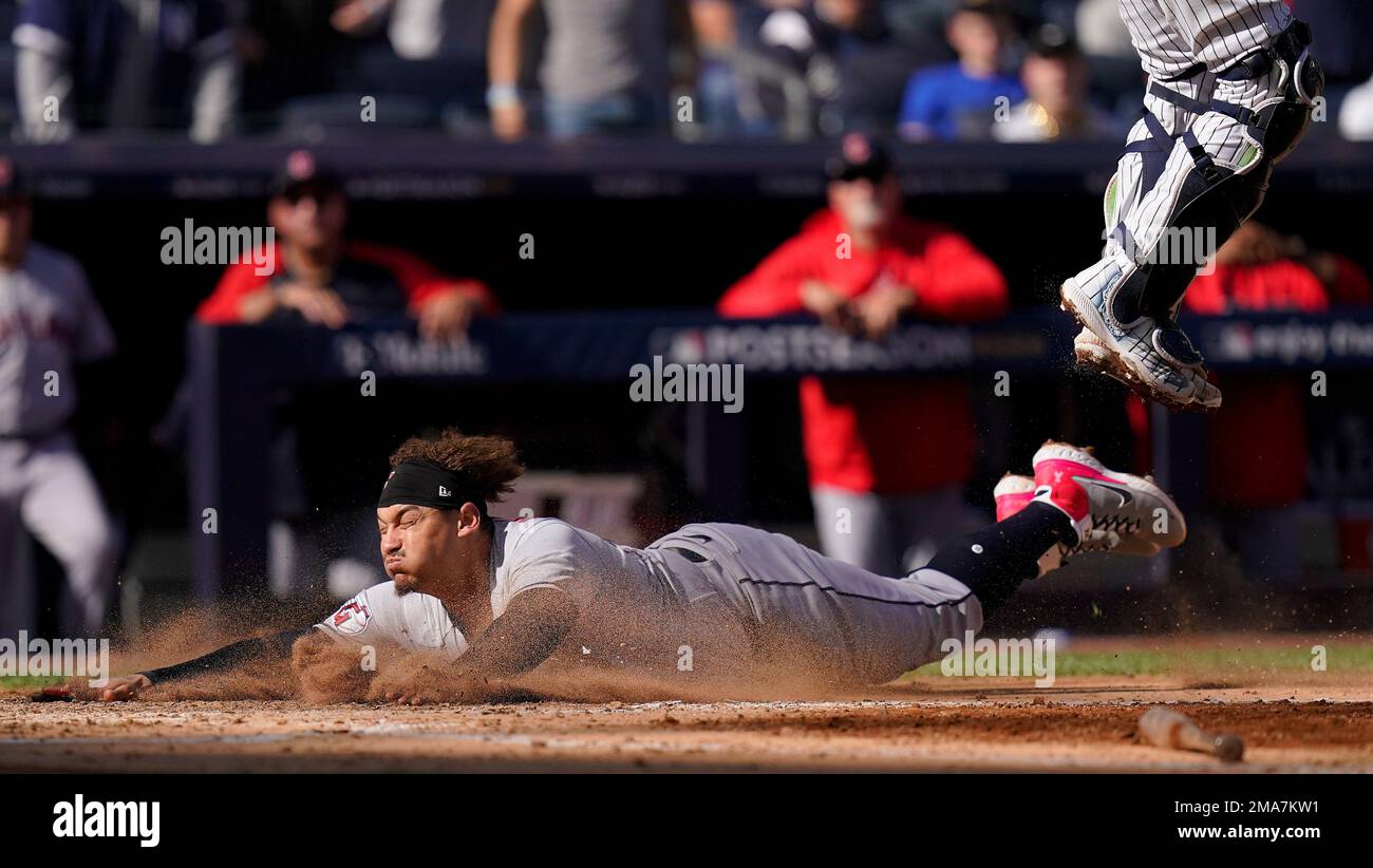 Cleveland Guardians Josh Naylor slides safely into home plate to score ...