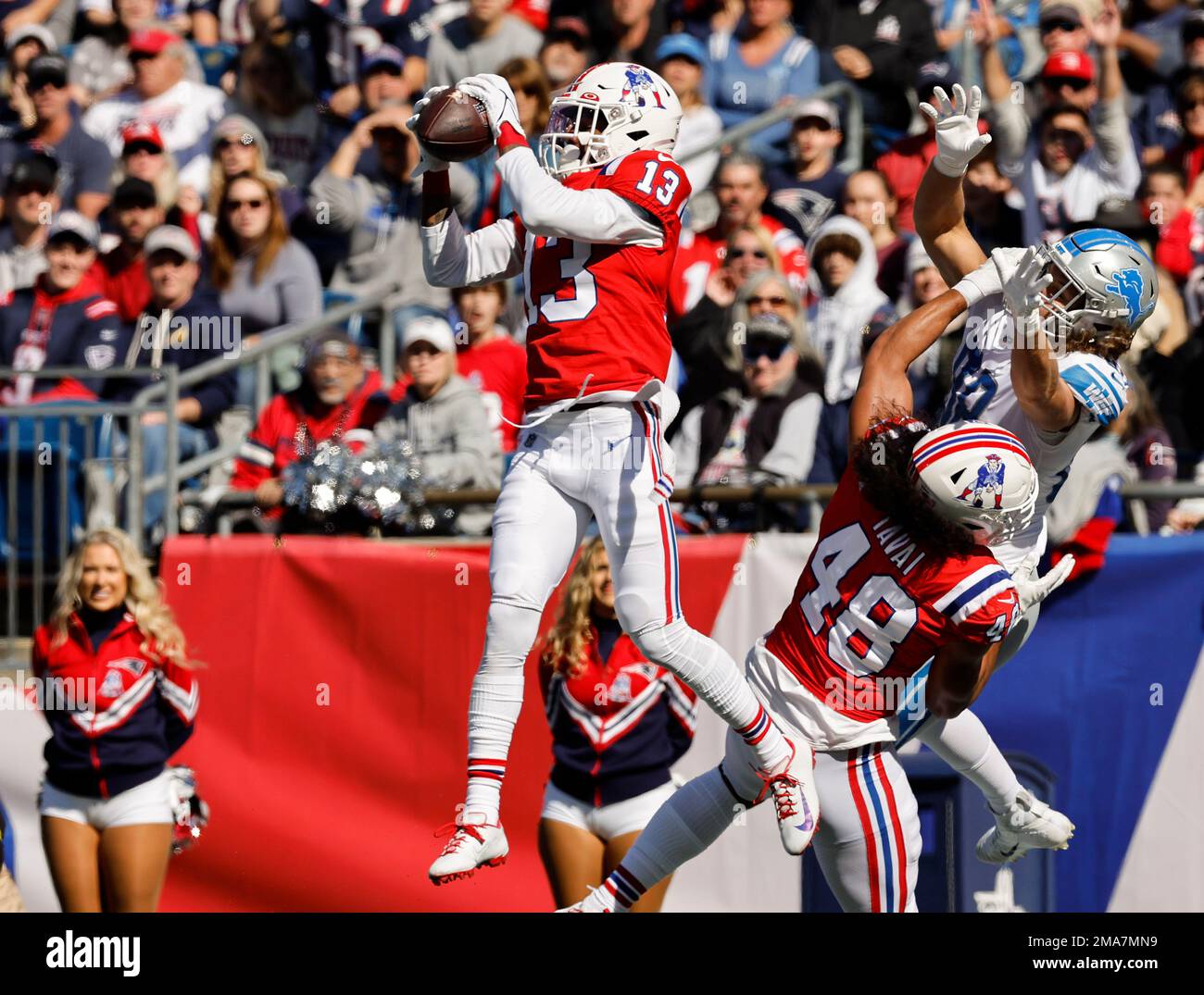 New England Patriots' Jack Jones intercepts a pass against the Detroit ...
