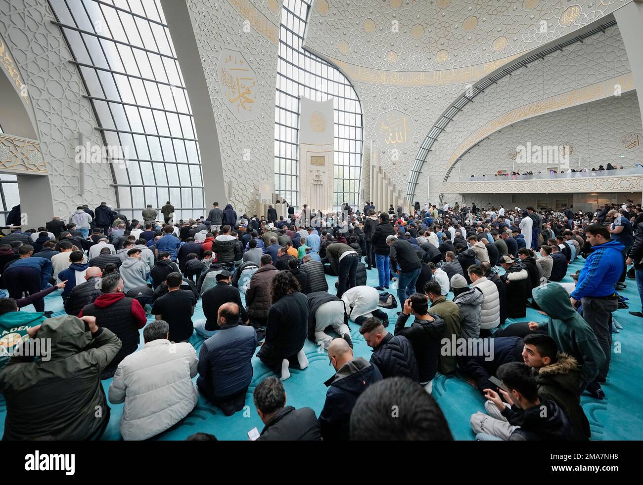 Muslims pray at the Cologne Central Mosque in Cologne, Germany, Friday ...