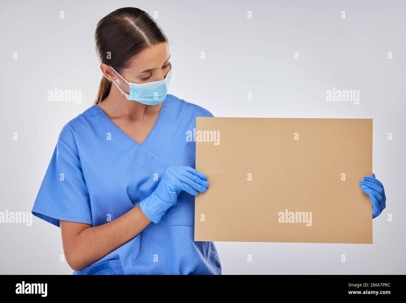 The public play a vital role in this. a female nurse holding a board ...