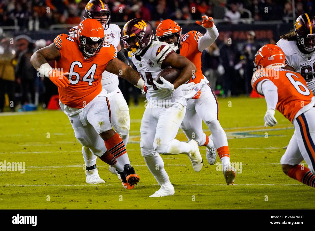 Washington Commanders running back Antonio Gibson is chased by Chicago ...