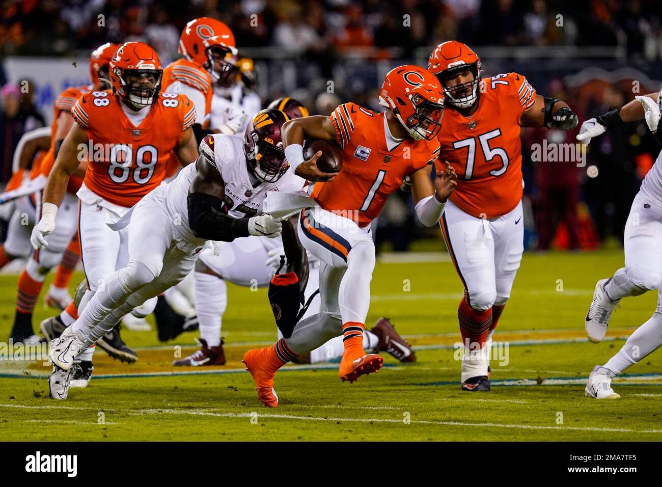 Chicago Bears quarterback Justin Fields is sacked by Washington ...