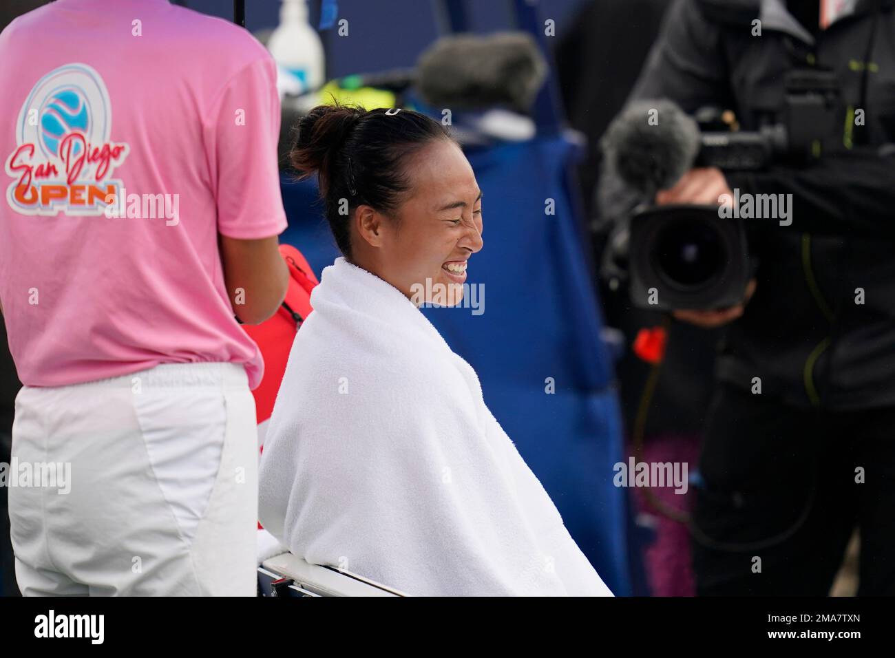 Qinwen Zheng of China reacts as the crowd sings a happy birthday song ...