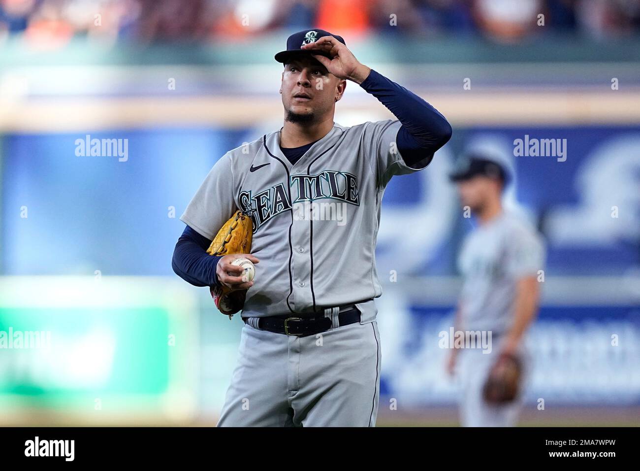 Seattle Mariners pitcher Luis Castillo reacts after giving up a two-run ...