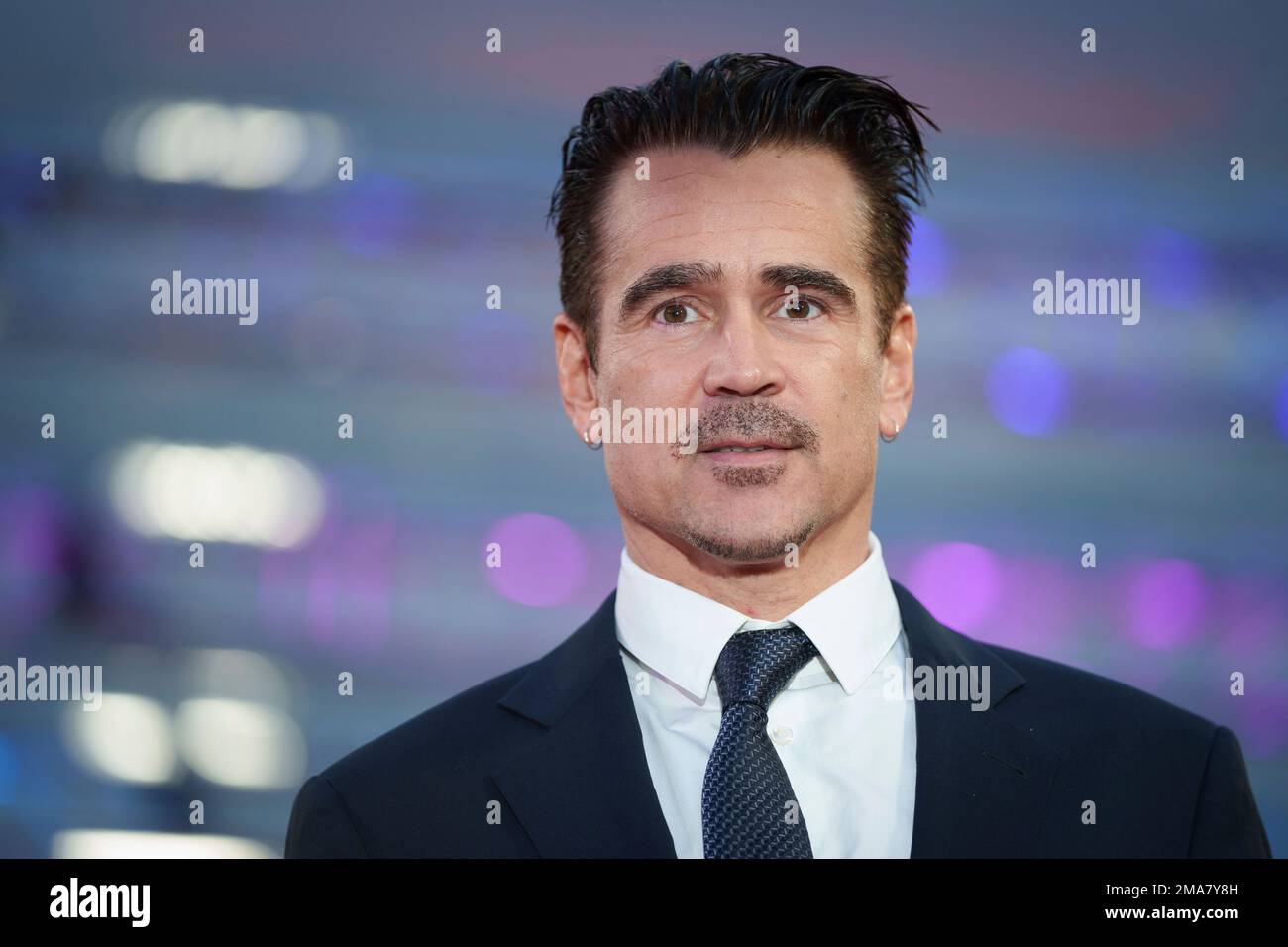 Colin Farrell poses for photographers upon arrival for the premiere of ...