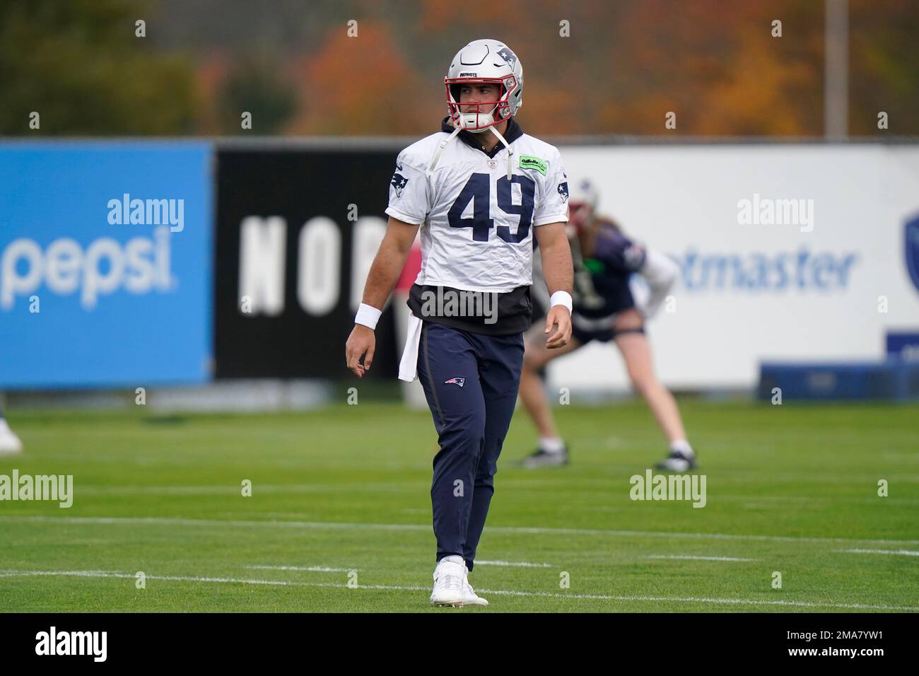 New England Patriots long snapper Joe Cardona (49) warms up during an ...
