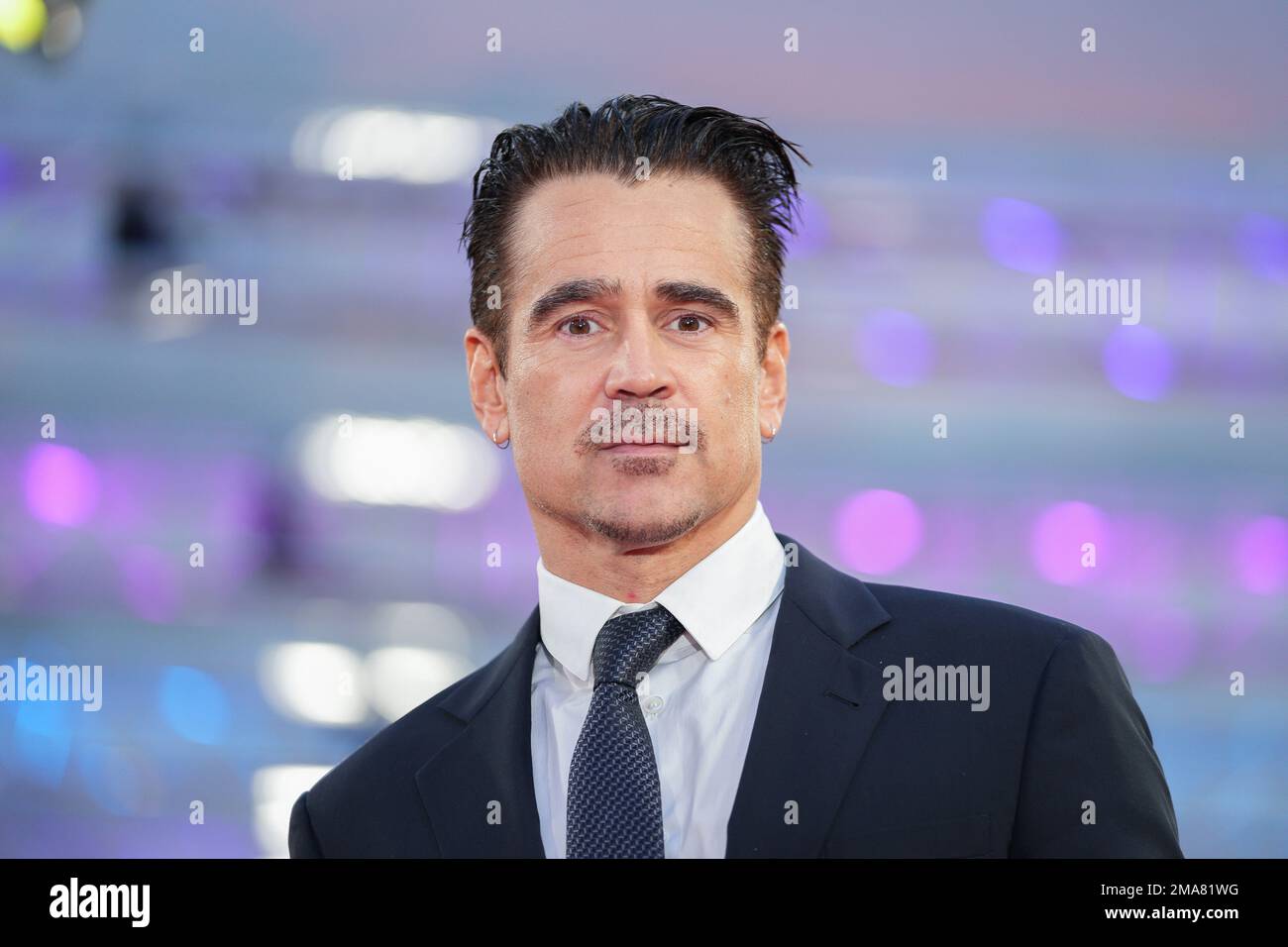 Colin Farrell poses for photographers upon arrival for the premiere of ...