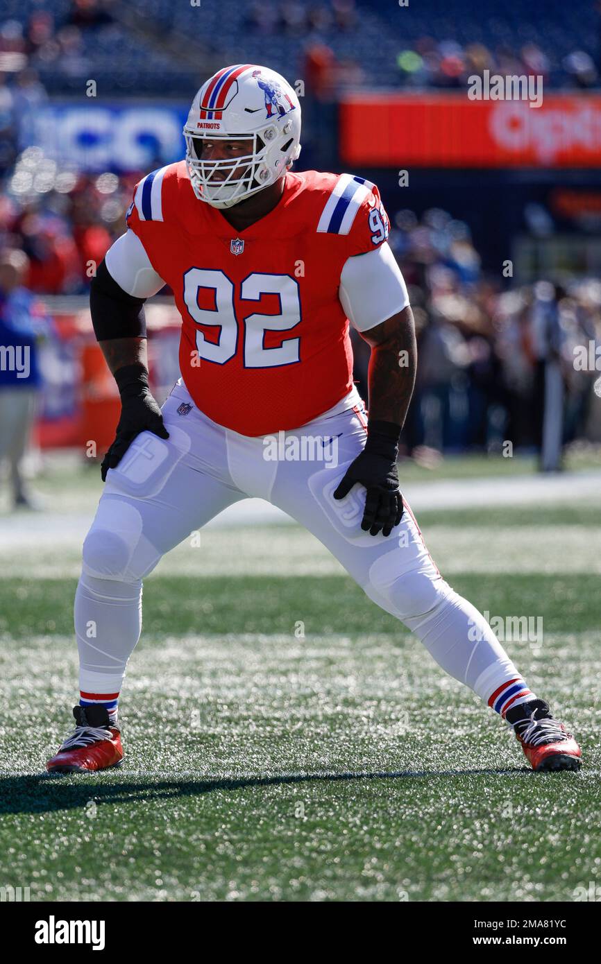 New England Patriots defensive tackle Davon Godchaux (92) stretches on ...