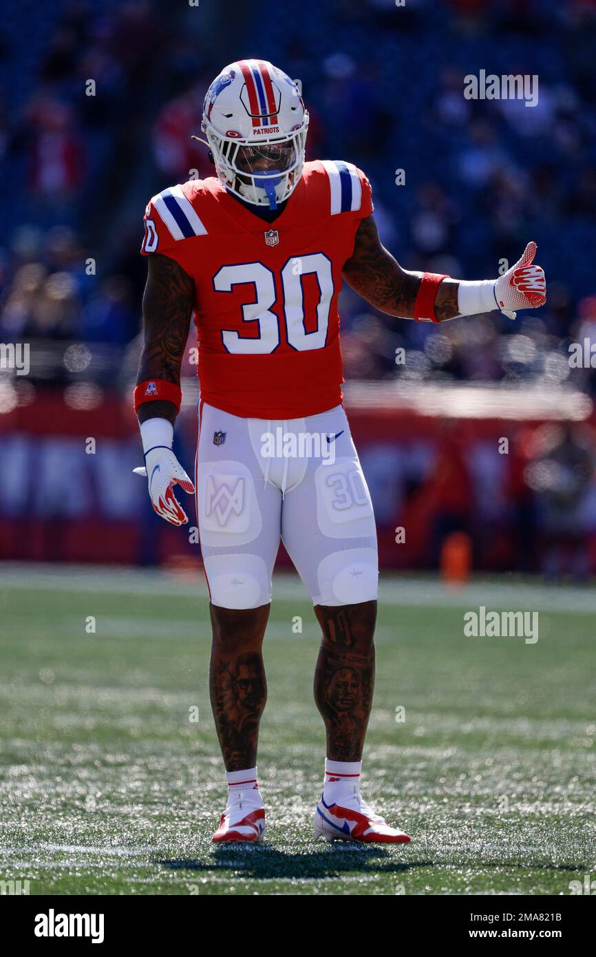 New England Patriots linebacker Mack Wilson Sr. (30) signals on the ...