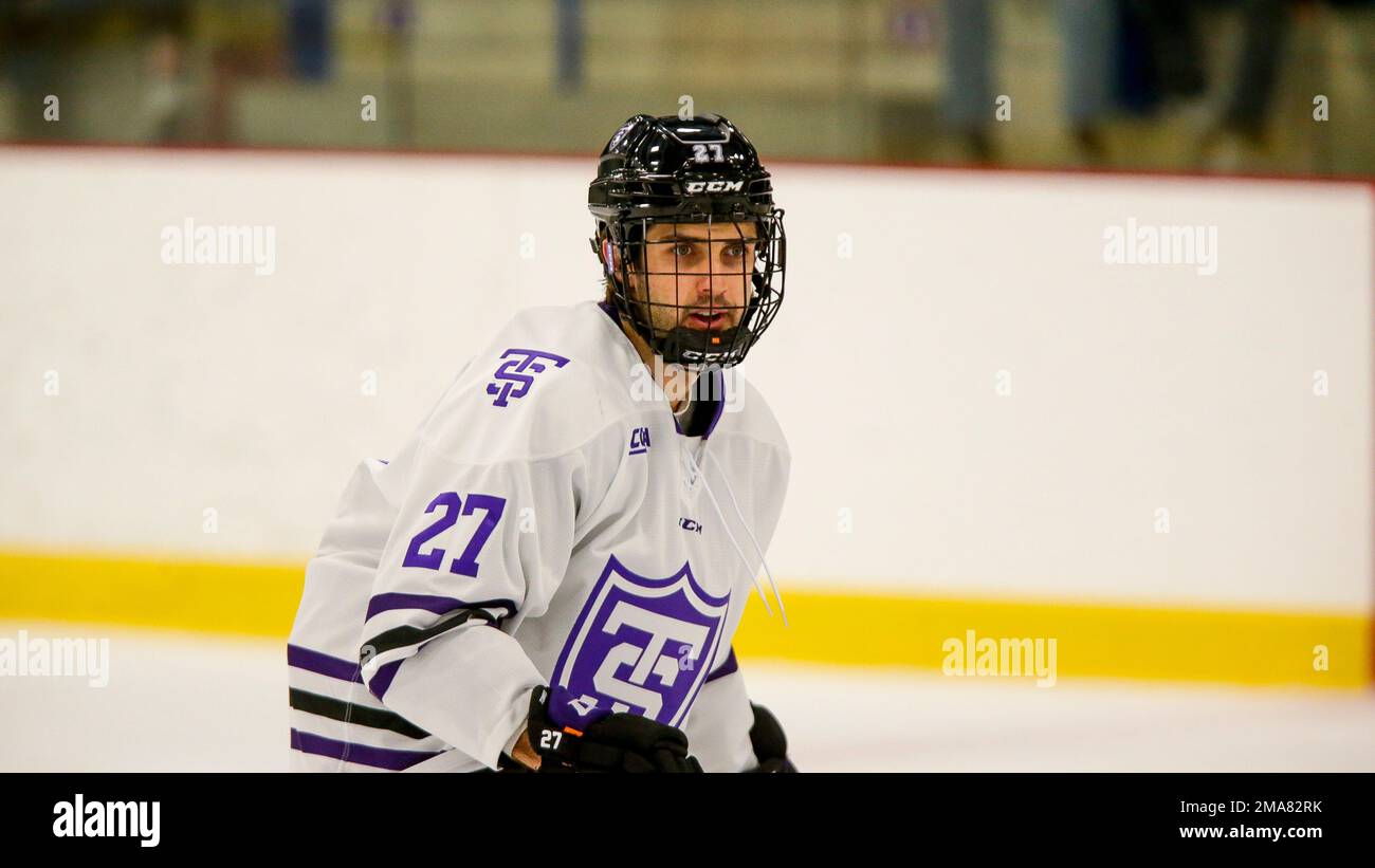 St. Thomas' Luke Perunovich plays during an NCAA hockey game against ...