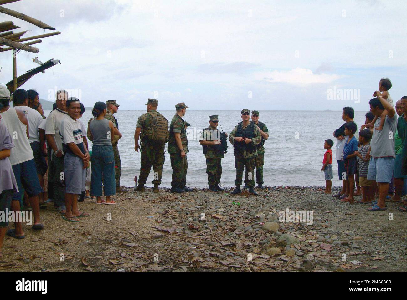 060221-N-4772B-189. [Complete] Scene Caption: US Navy (USN) Sailors ...