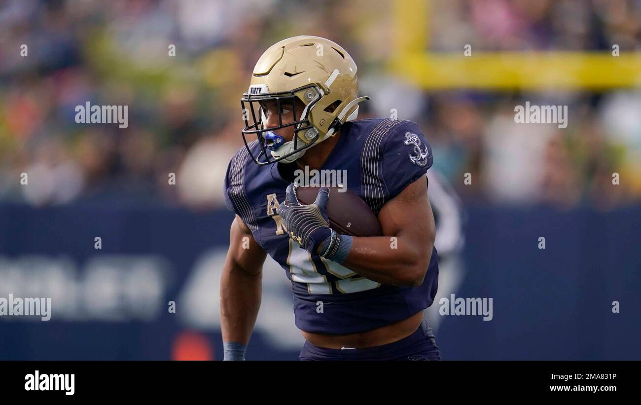 Navy fullback Daba Fofana runs with the ball during the first half of ...