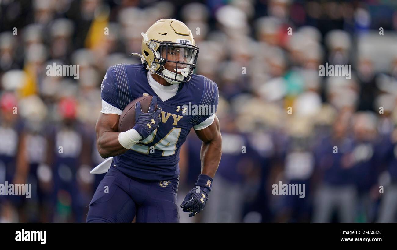 Navy wide receiver Maquel Haywood runs with the ball during the first ...