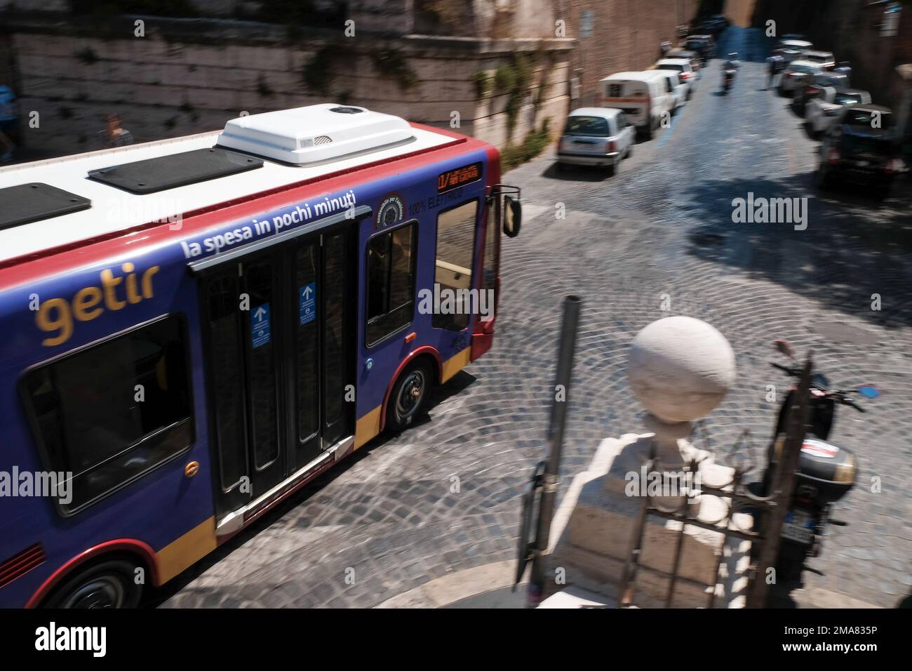 Getir bus in Rome Italy travelling on the cobbled streets near the ...