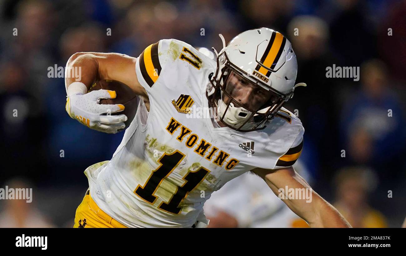 Wyoming wide receiver Wyatt Wieland (11) carries the ball during the ...
