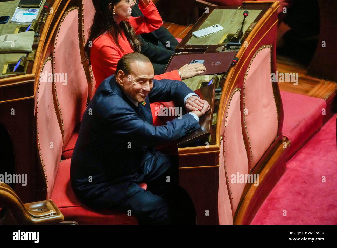 Forza Italia's president Silvio Berlusconi takes his seat in the ...