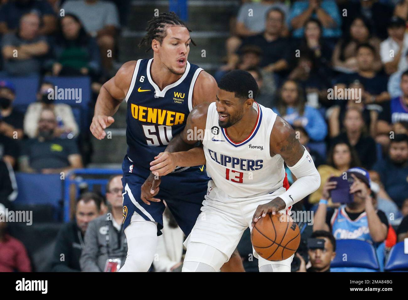 Los Angeles Clippers forward Paul George (13) drives against Denver ...