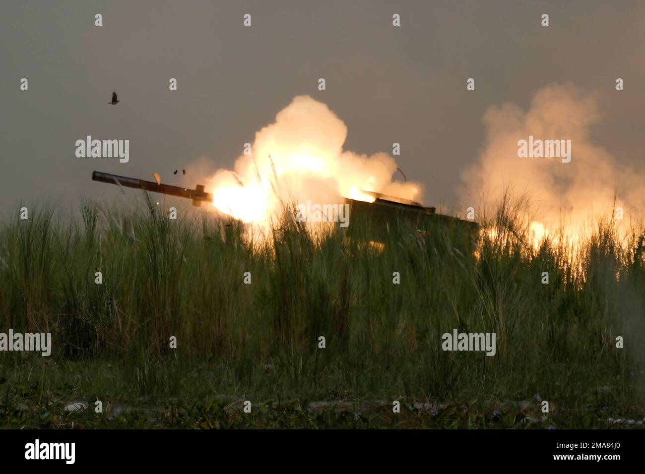 A U.S. M142 High Mobility Artillery Rocket System (HIMARS) fires a ...