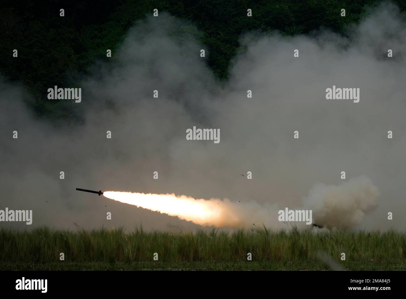 A U.S. M142 High Mobility Artillery Rocket System (HIMARS) fires a ...