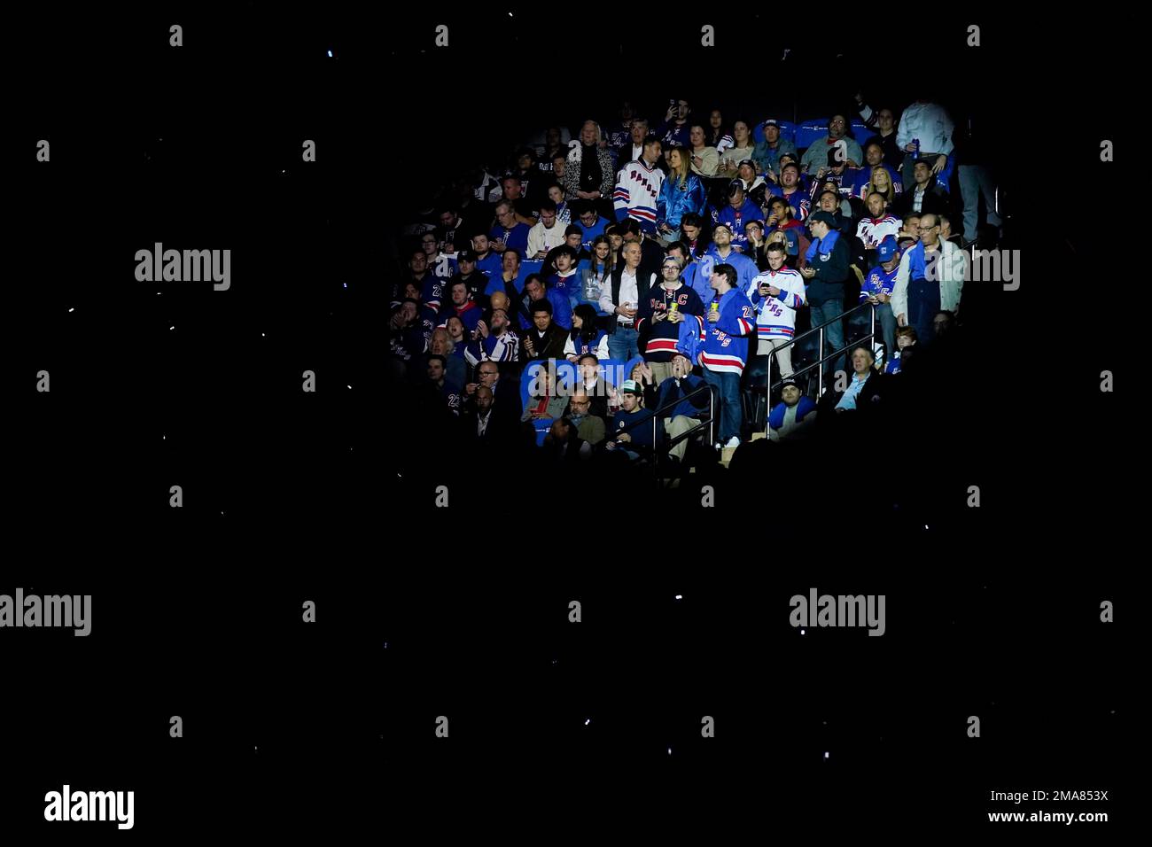 New York Rangers fans cheer as players are introduced before an NHL ...