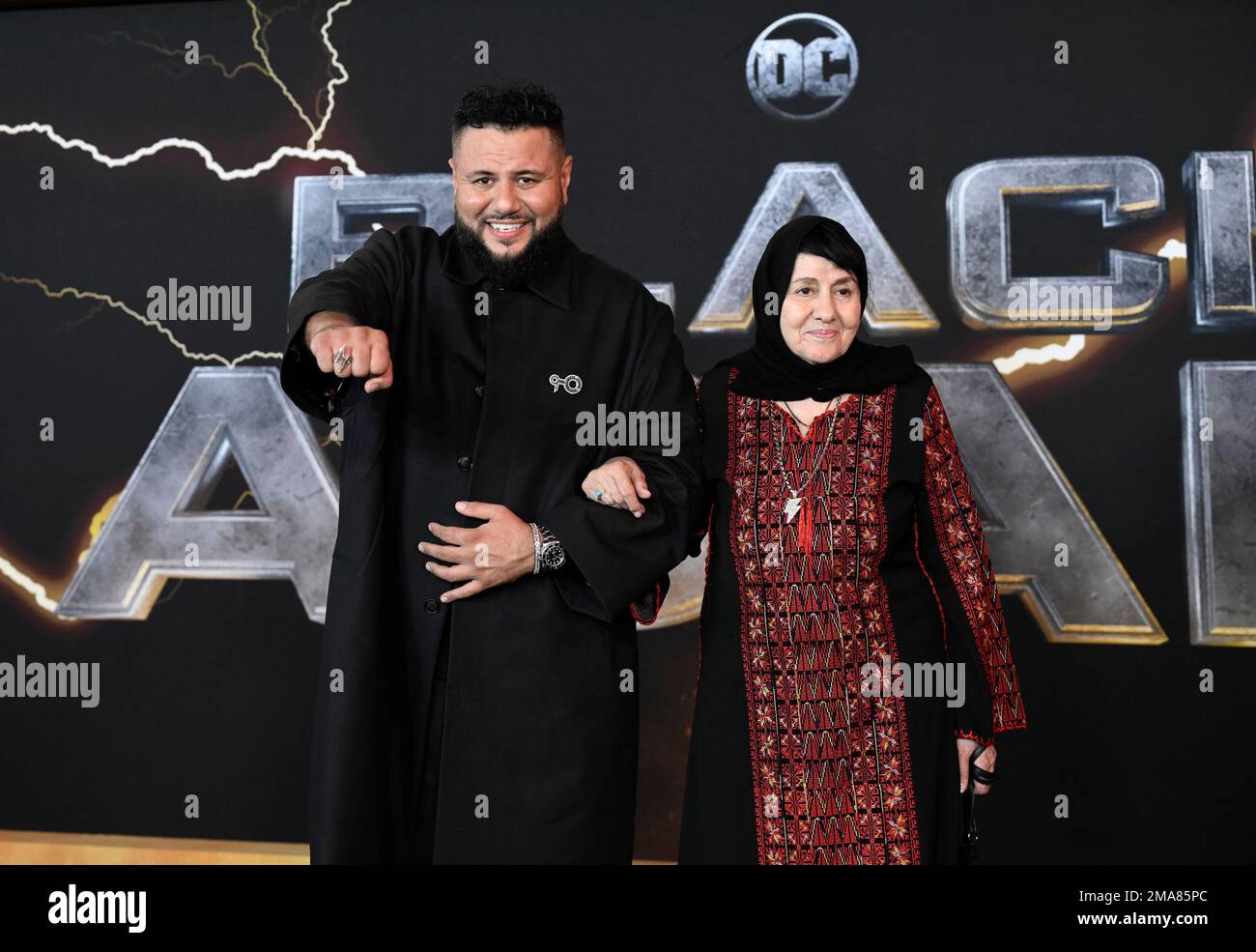 Mohammed Amer, left, and his mother attend the world premiere of "Black ...