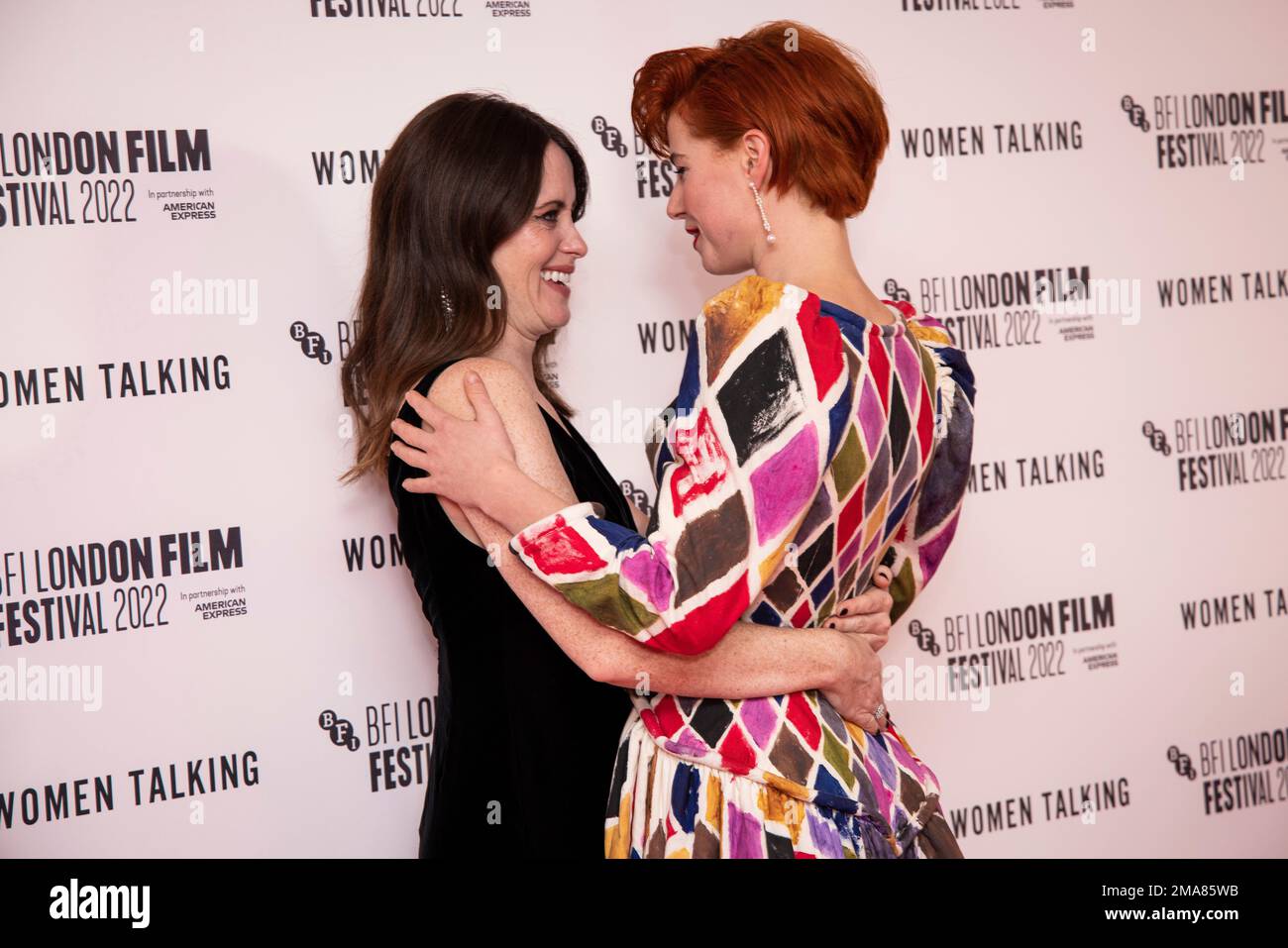 Claire Foy, left, and Jessie Buckley pose for photographers upon ...