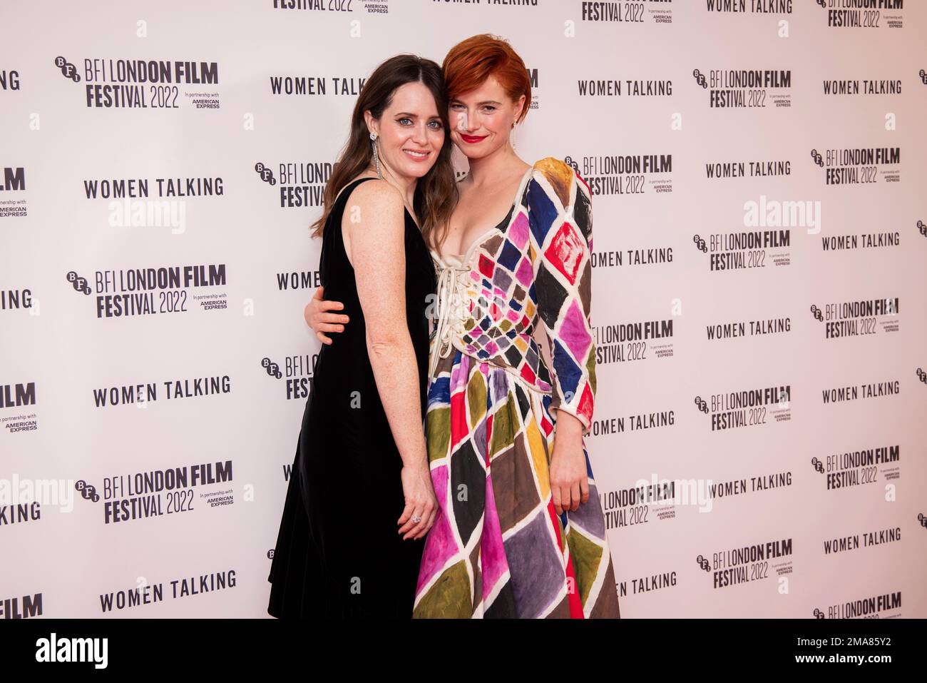 Claire Foy, left, and Jessie Buckley pose for photographers upon ...
