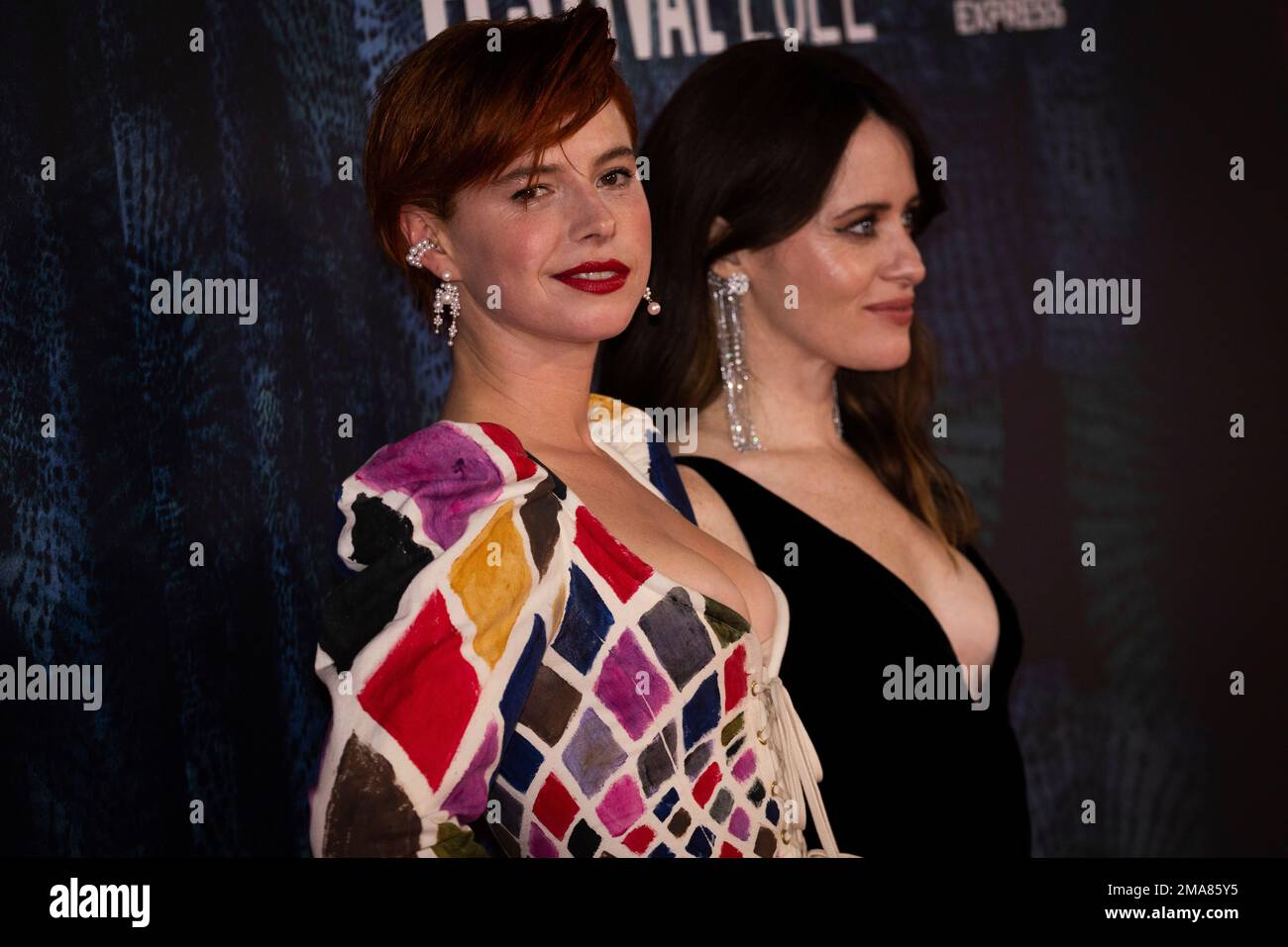 Claire Foy, right and Jessie Buckley pose for photographers upon ...