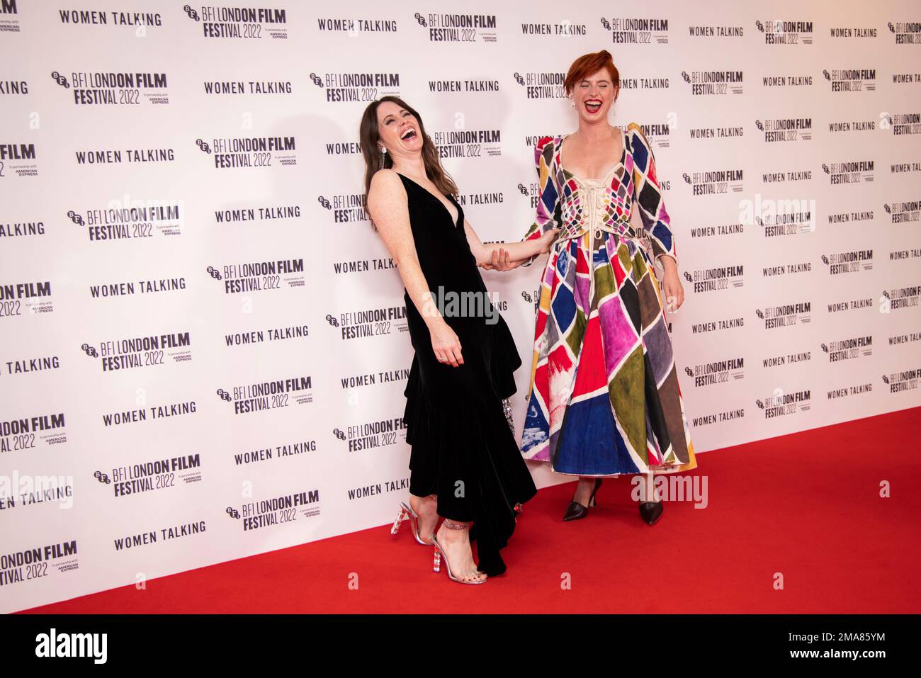 Claire Foy, left, and Jessie Buckley pose for photographers upon ...