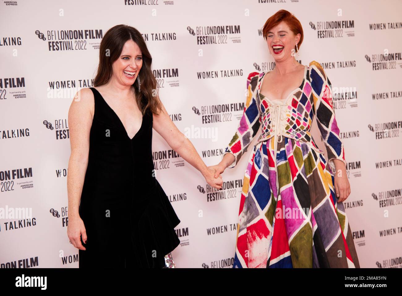 Claire Foy, left, and Jessie Buckley pose for photographers upon ...