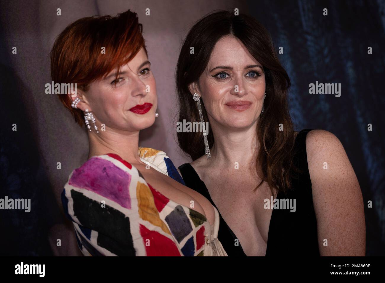 Claire Foy, right and Jessie Buckley pose for photographers upon ...