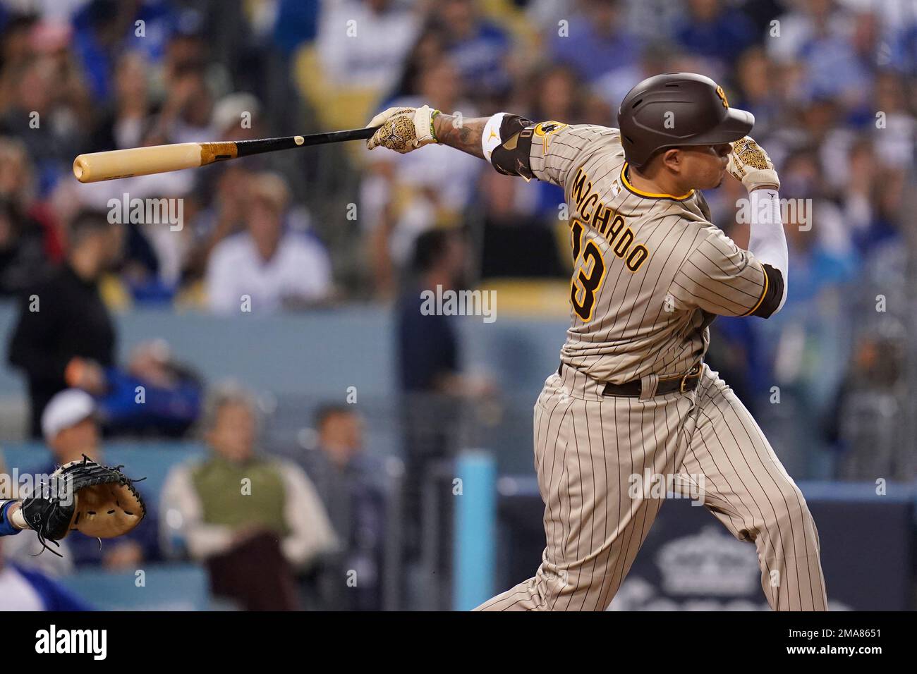 San Diego Padres' Manny Machado follows through on an RBI double during ...