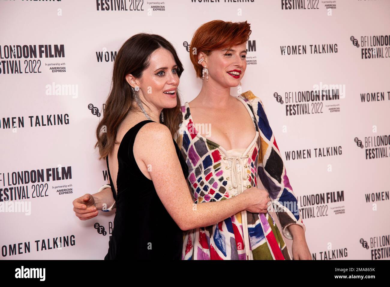 Claire Foy, left, and Jessie Buckley pose for photographers upon ...