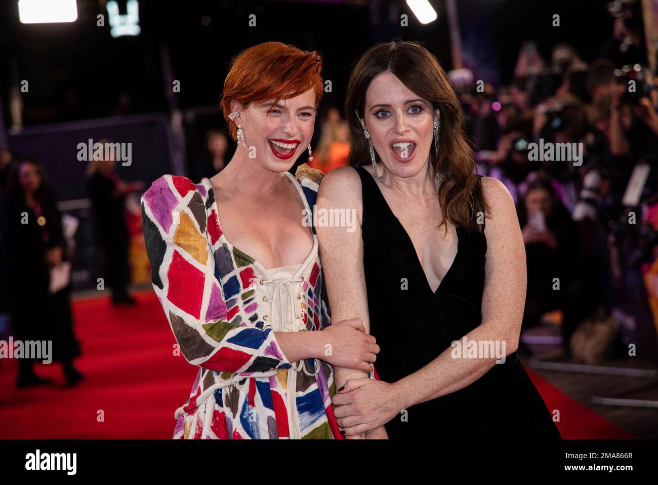Claire Foy, right and Jessie Buckley pose for photographers upon ...